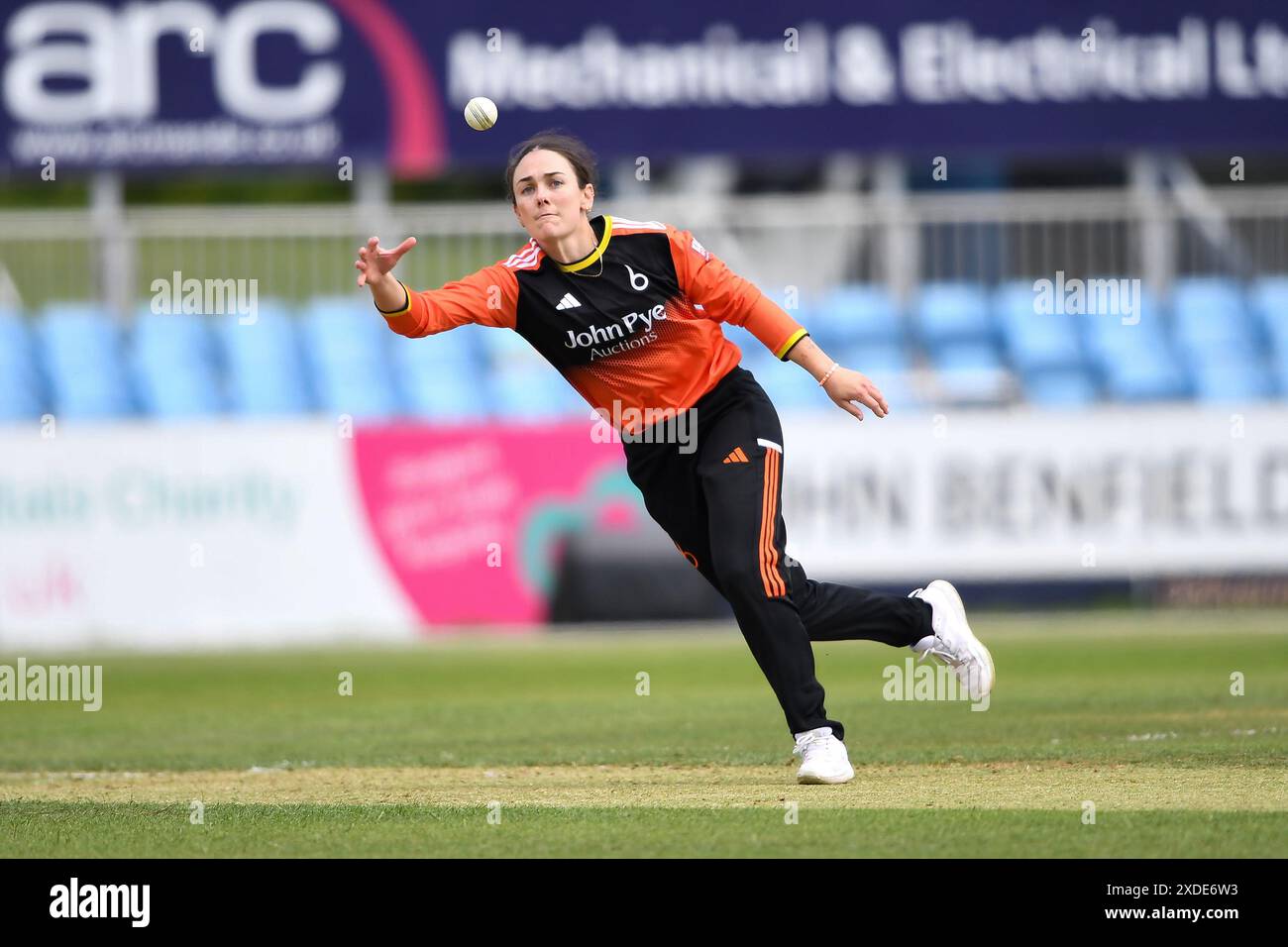 Derby, UK. 22 June 2024. Heather Graham of The Blaze fielding off her ...