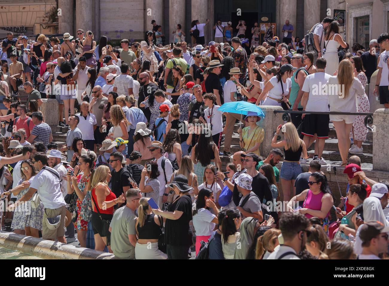 Rome, Italy. 22 June.2024. The Trevi fountain is crowded with tourists ...