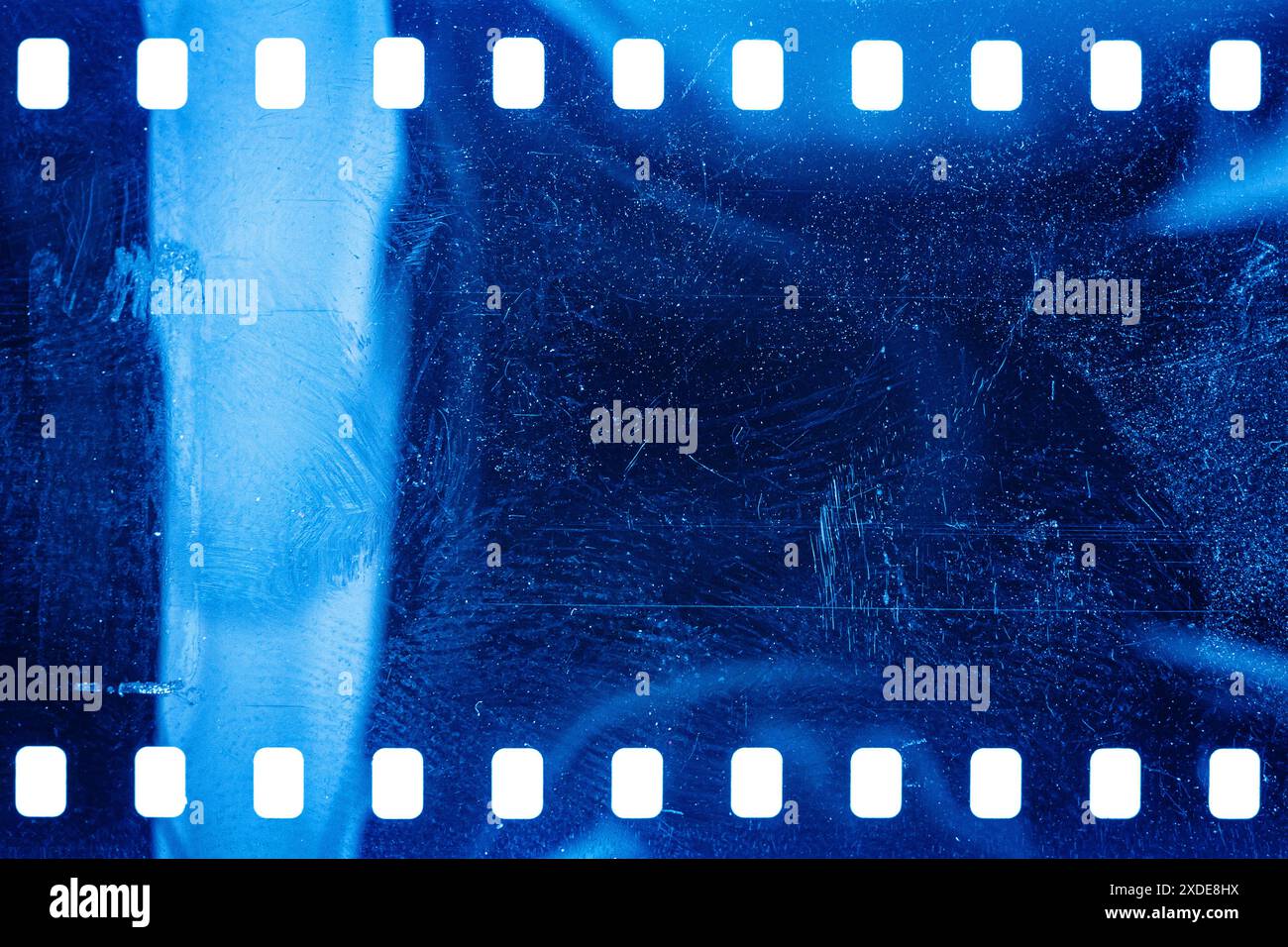 Dusty and grungy 35mm film texture or surface. Perforated scratched ...