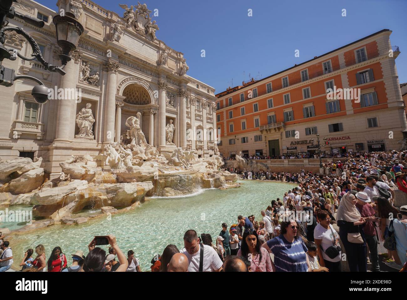 Rome, Italy. 22 June.2024. The Trevi fountain is crowded with tourists ...