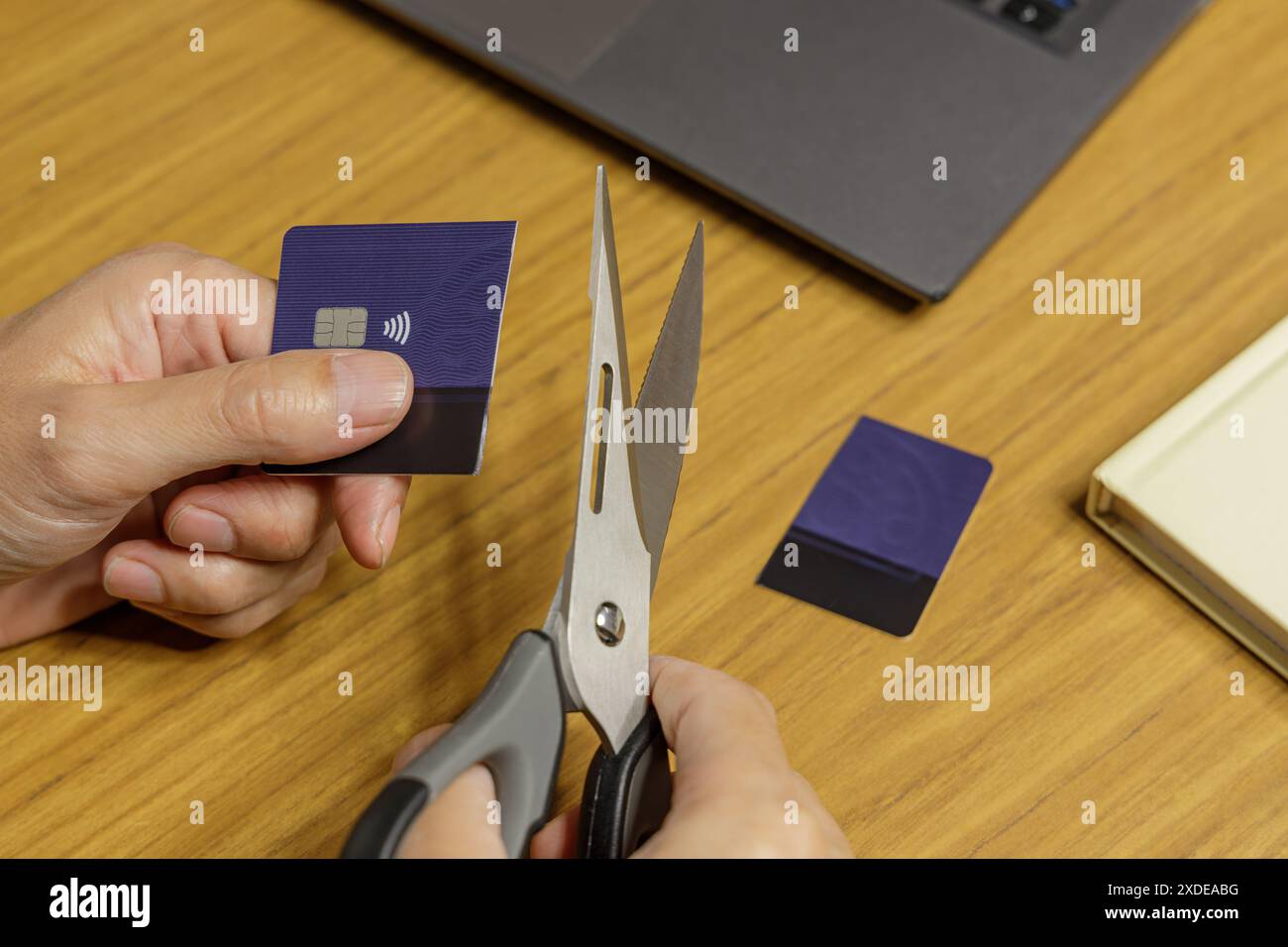 Card credit cutting hi-res stock photography and images - Alamy