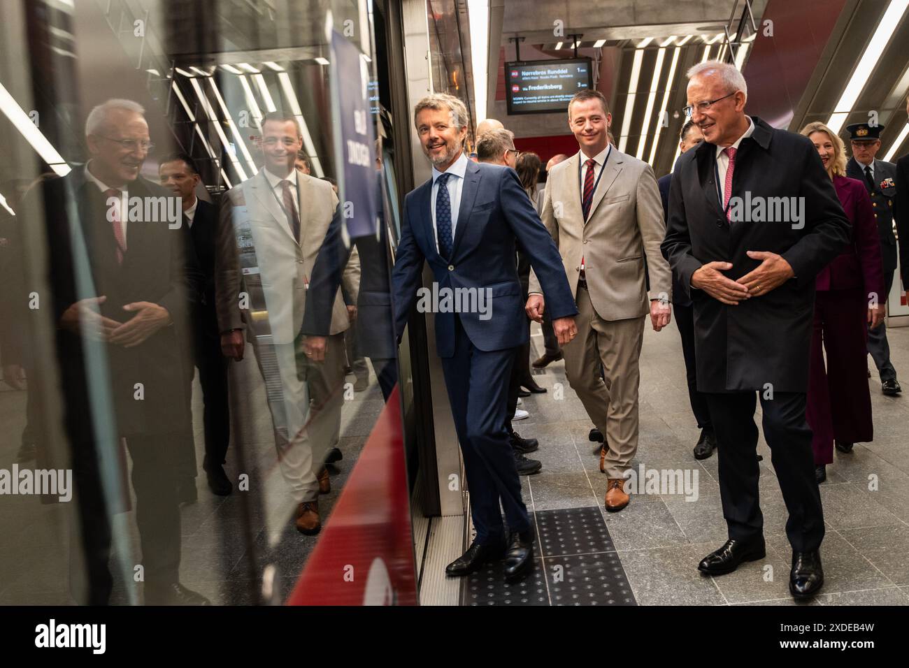 King Frederick X, center, and Transport Minister Thomas Danielsen ...