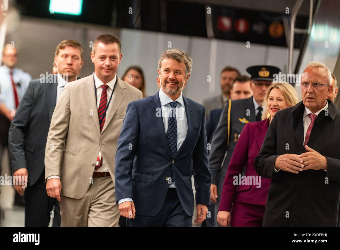 King Frederick X, center, and Transport Minister Thomas Danielsen ...