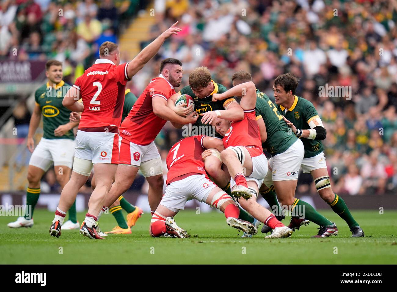 South Africa's Evan Roos (centre) is tackled during the Qatar Airways ...
