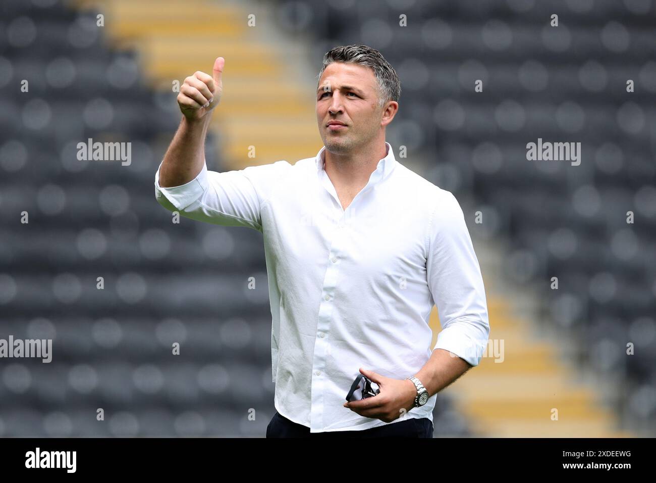 Warrington Wolves' Head Coach Sam Burgess inspects the pitch prior to the Betfred Super League ...