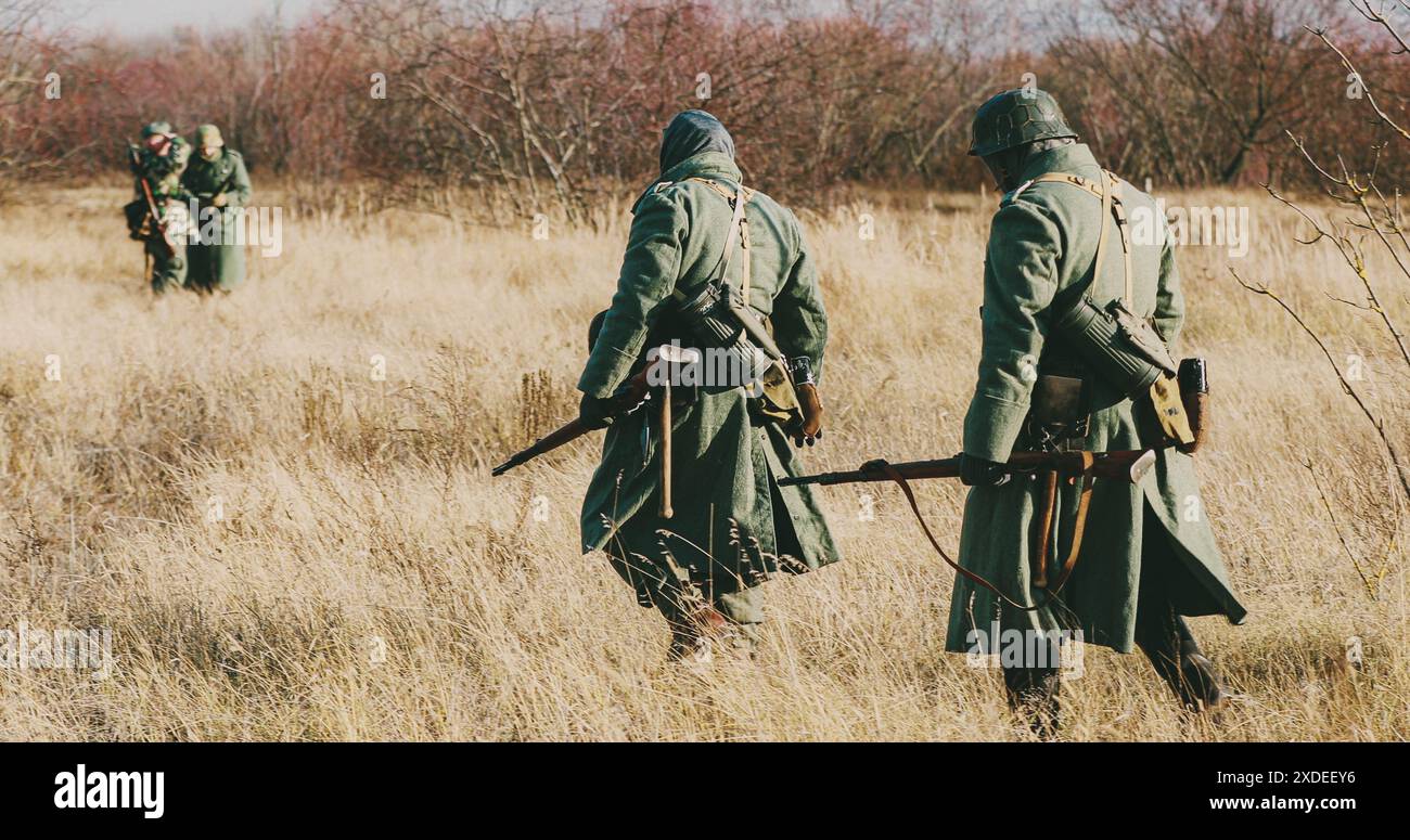 Re-enactors Dressed As German Infantry Soldiers In World War II ...