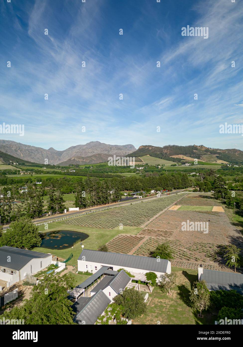 Mountains stand over peaceful rural setting, offering sense of ...