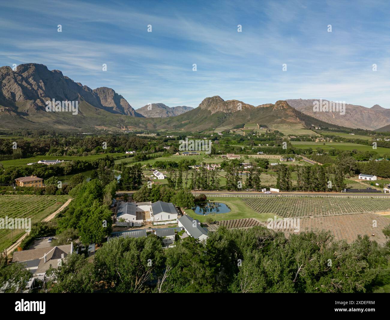 Mountains stand over peaceful rural setting, offering sense of ...