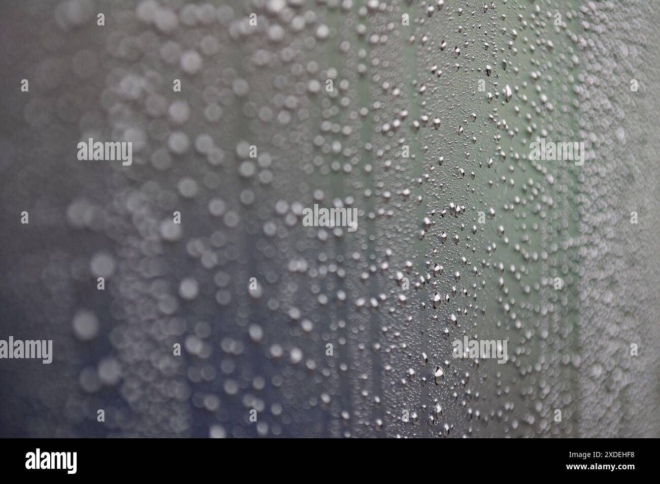 Side view of water droplets with black wallpaper background Stock Photo ...