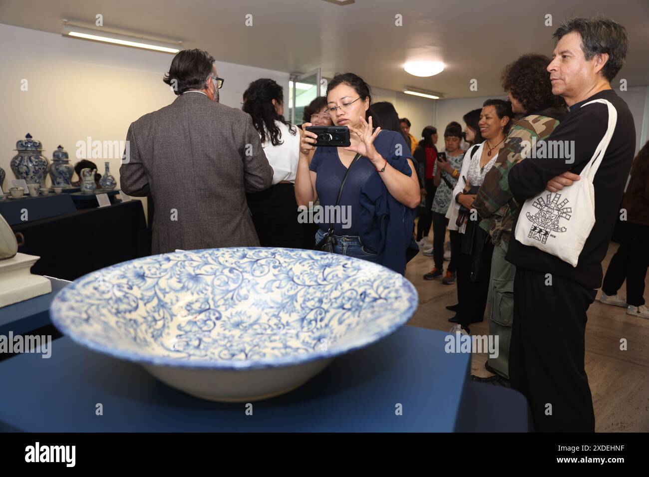 Mexico City, Mexico. 21st June, 2024. People look at porcelain exhibits ...