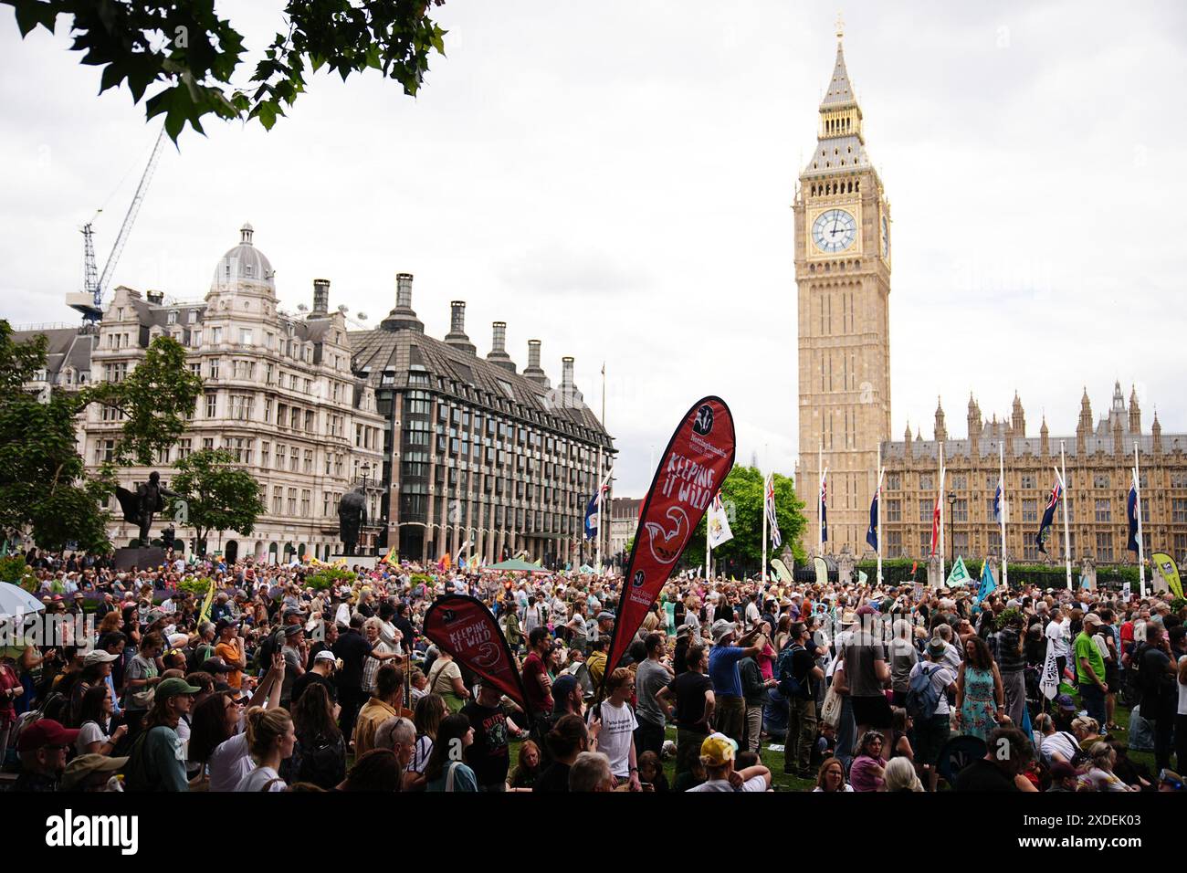 People during a Restore Nature Now rally at Parliament Square in ...