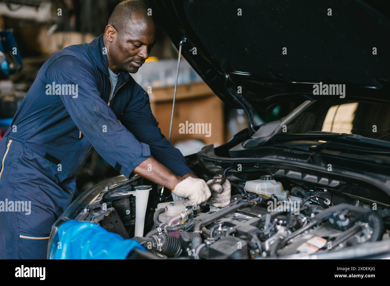 Garage Mechanic African Black male professional working car auto ...