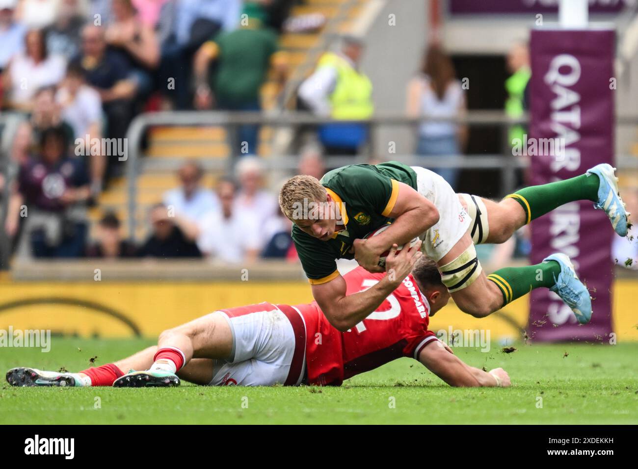 Mason Grady of Wales tackles Pieter-Steph du Toit South Africa during ...