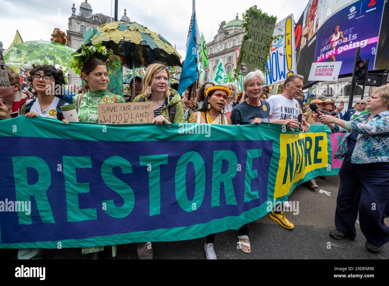 London, UK. 22 June 2024. Activists at Piccadilly Circus including Emma ...