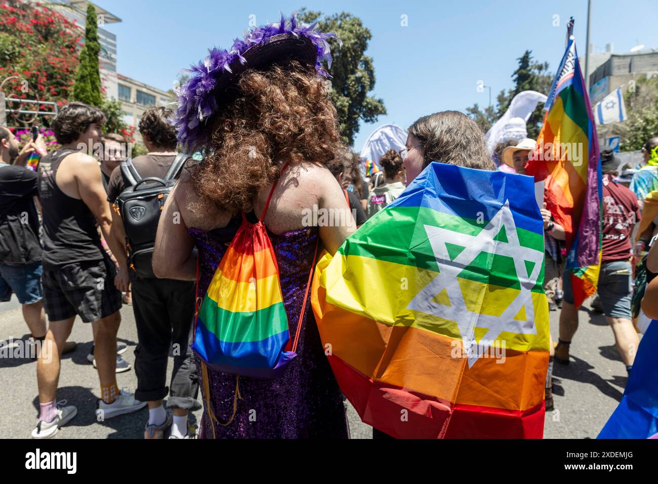 Haifa, Israel June 21, 2024, Pride Parade. Two people seen from behind ...