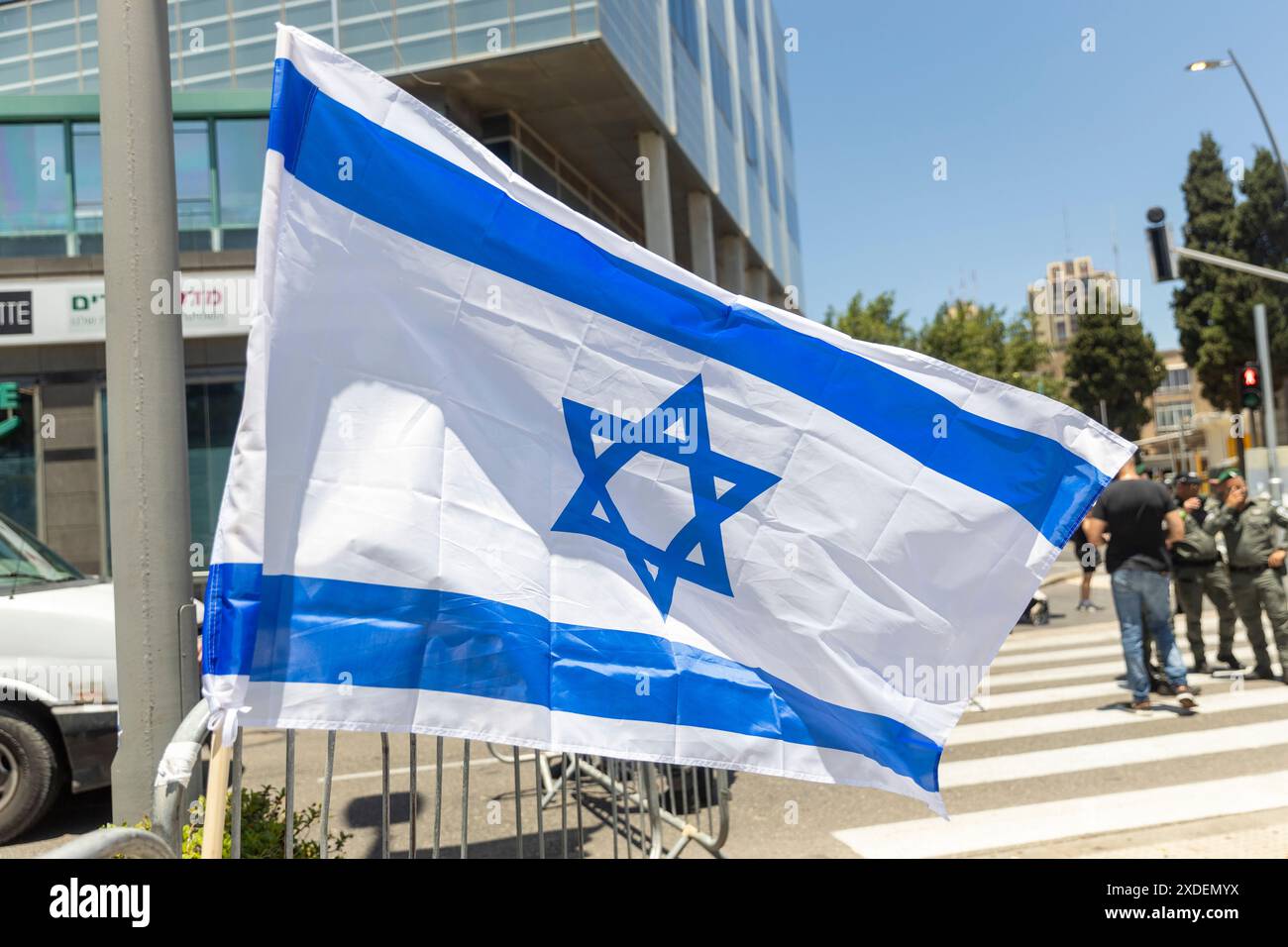 Haifa, Israel June 21, 2024, Pride Parade. Israeli flag in front of ...