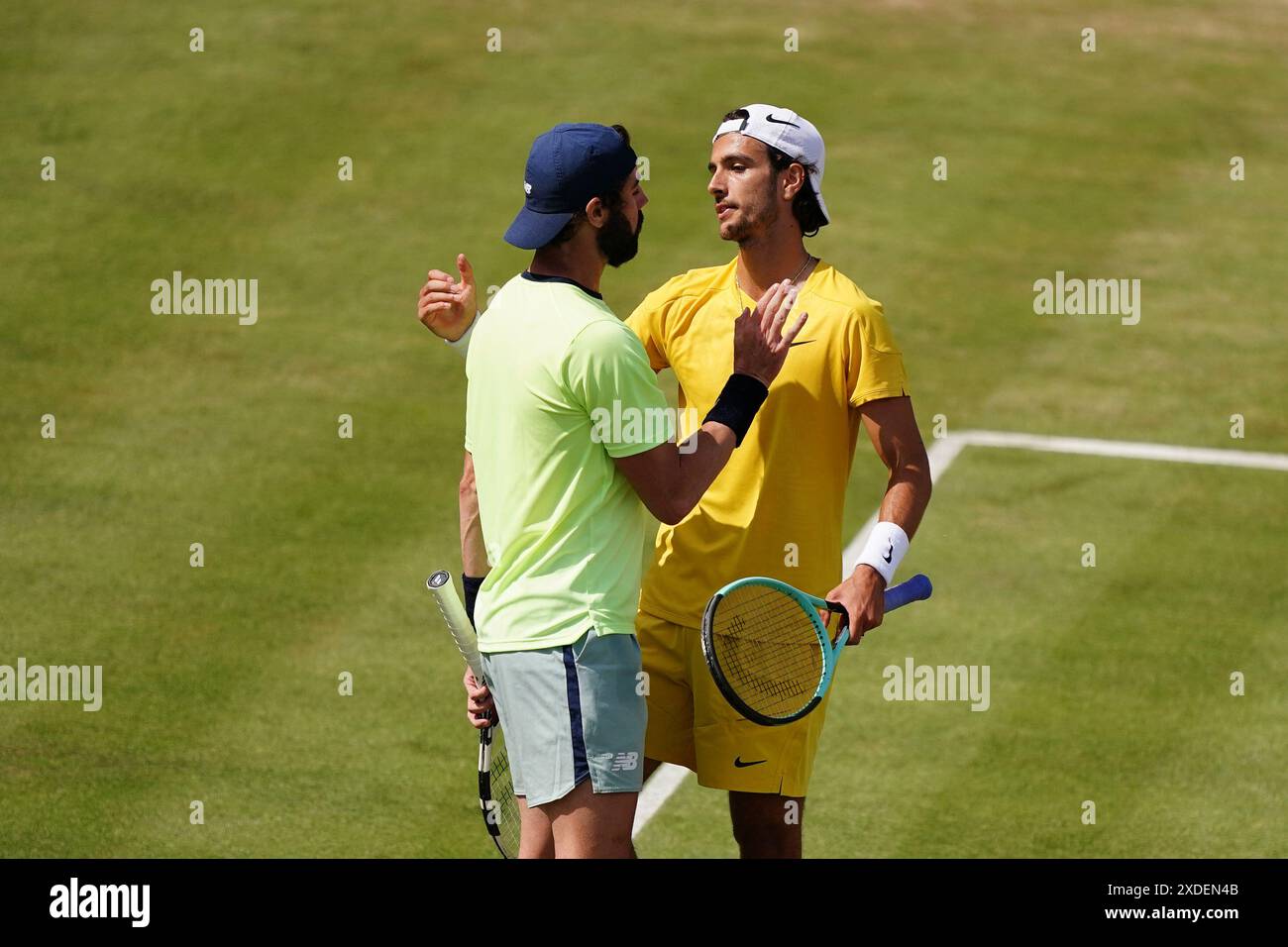 Lorenzo Musetti celebrates victory over Jordan Thompson (left) on day ...
