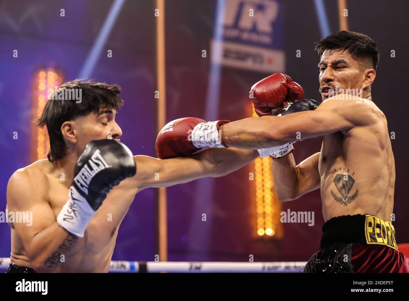 June 21, 2024: (L-R) Floyd Diaz and Francisco Pedroza exchange punches ...