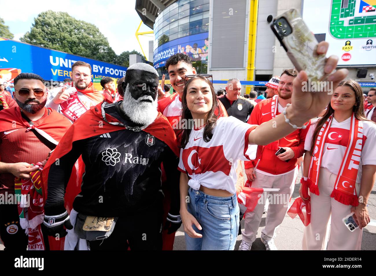 Turkey and Besiktas fan Necdet Olcerman, known as Udineco, (left) takes ...