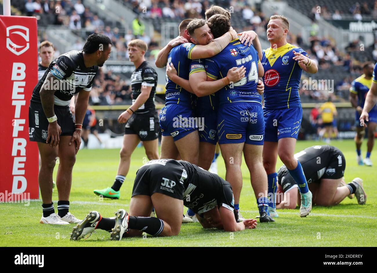 Warrington Wolves' Danny Walker (L) celebrates with teammates after ...