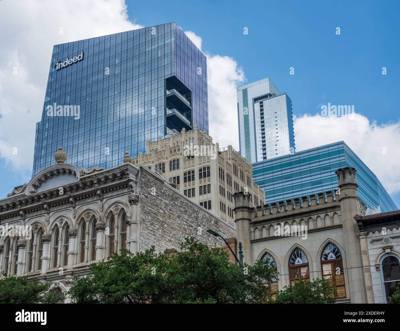 Austin, Texas - 15 June 2024: Indeed HQ skyscraper soars above older ...