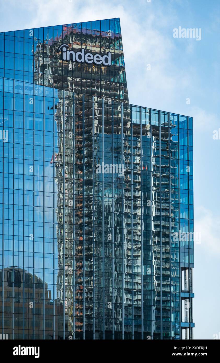 Austin, Texas - 15 June 2024: Indeed HQ skyscraper reflects other ...