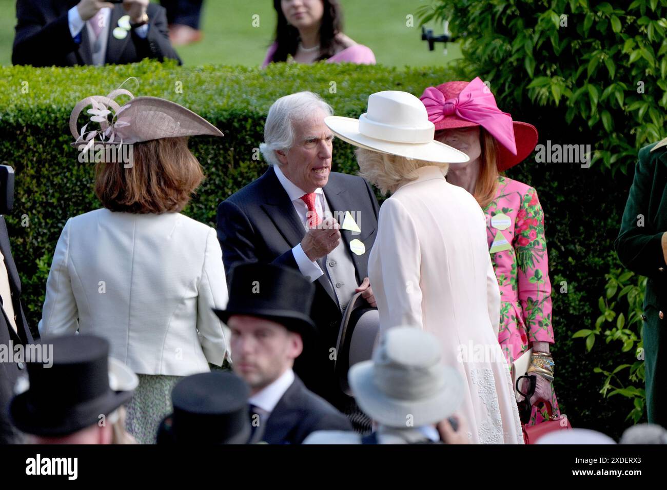 US actor and director, Henry Winkler (centre) is introduced to Queen ...