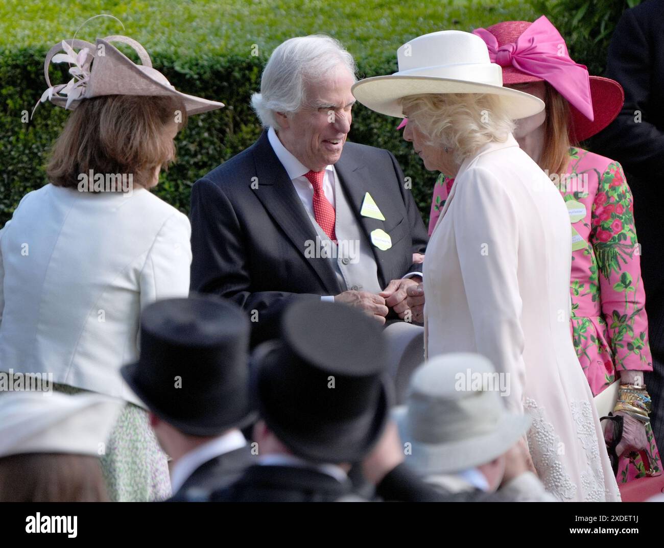 US actor and director, Henry Winkler (centre) is introduced to Queen ...