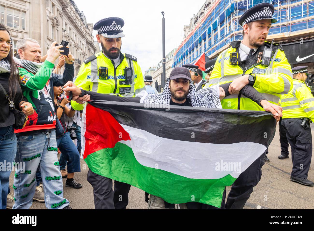 London, UK. 22 JUN, 2024. Protestor is arrested as Youth Demand block ...