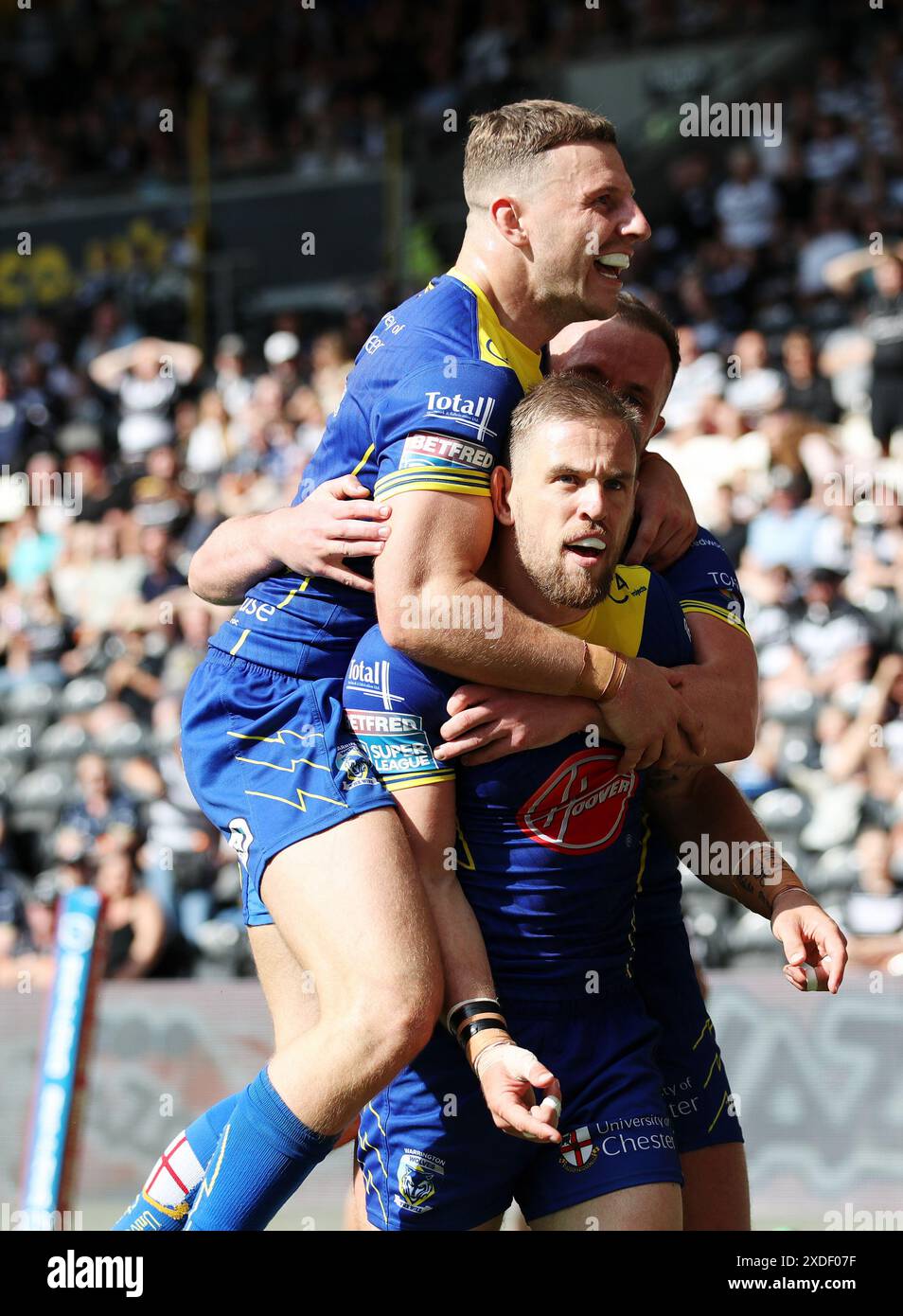 Warrington Wolves' Matt Dufty celebrates with teammates George Williams ...