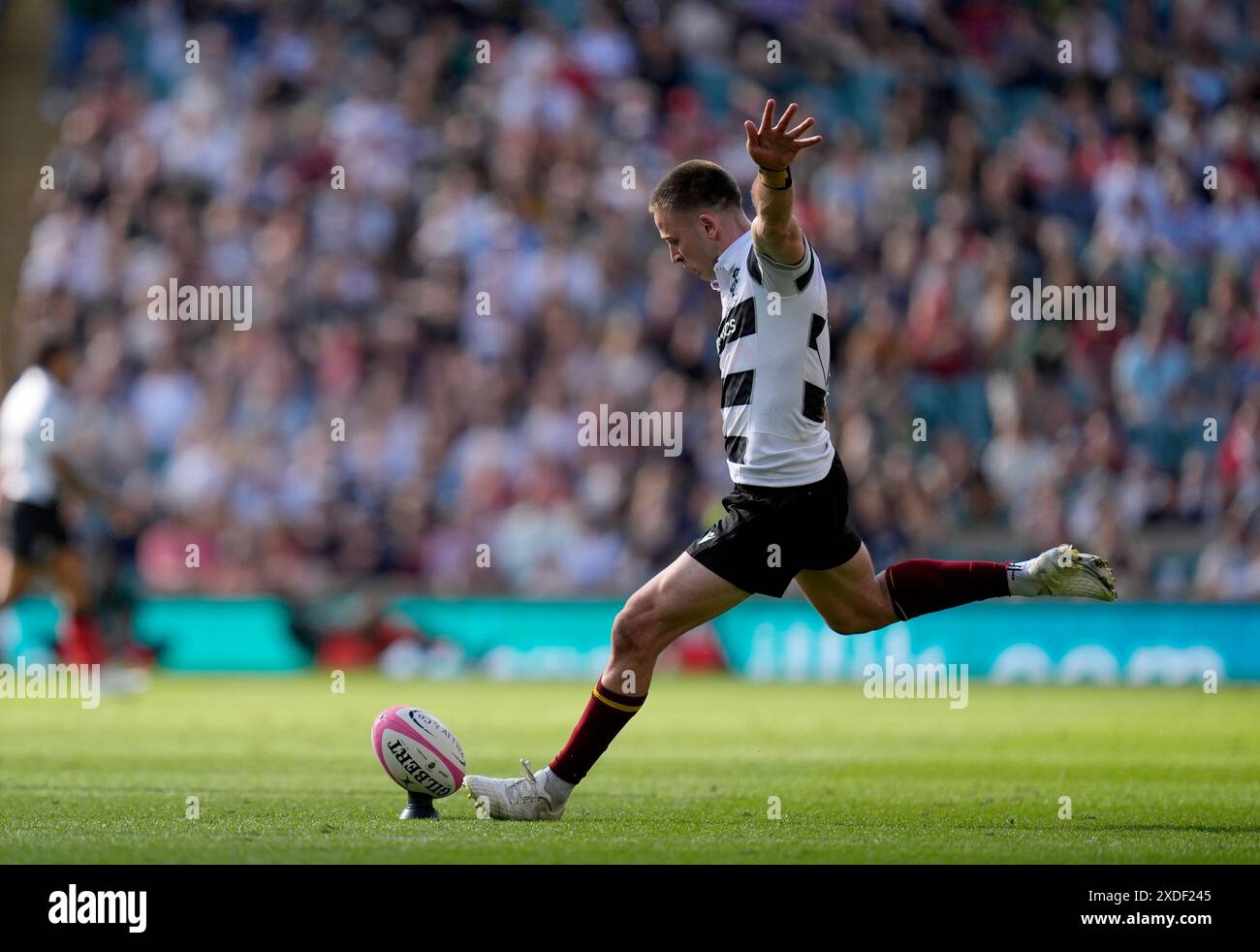 Barbarians' Fergus Burke kicks a conversion during the Killik Cup match ...
