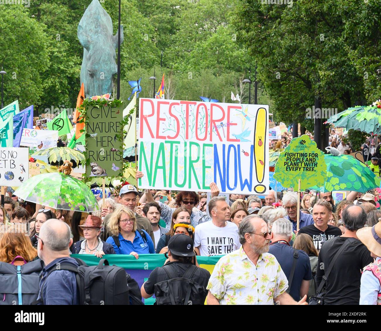 London, UK. 22nd June 2024. Thousands walk for Restore Nature Now led by naturalist Chris ...