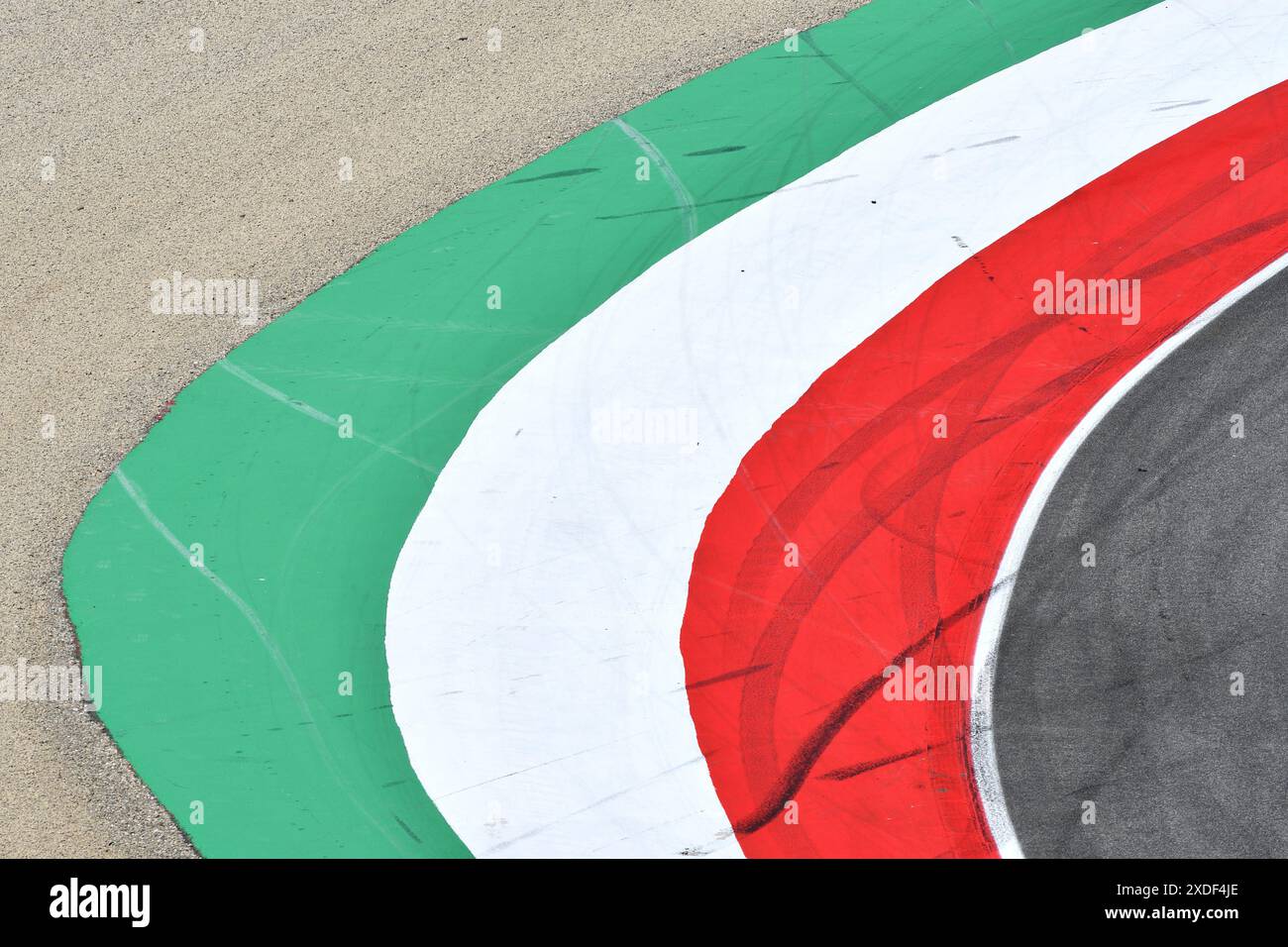 colored curb on a racing track Stock Photo - Alamy
