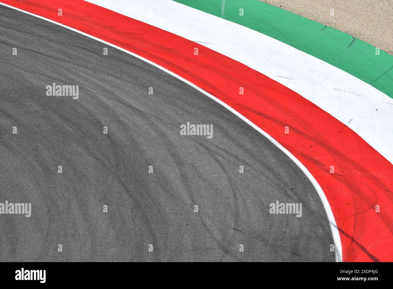 colored curb on a racing track Stock Photo - Alamy