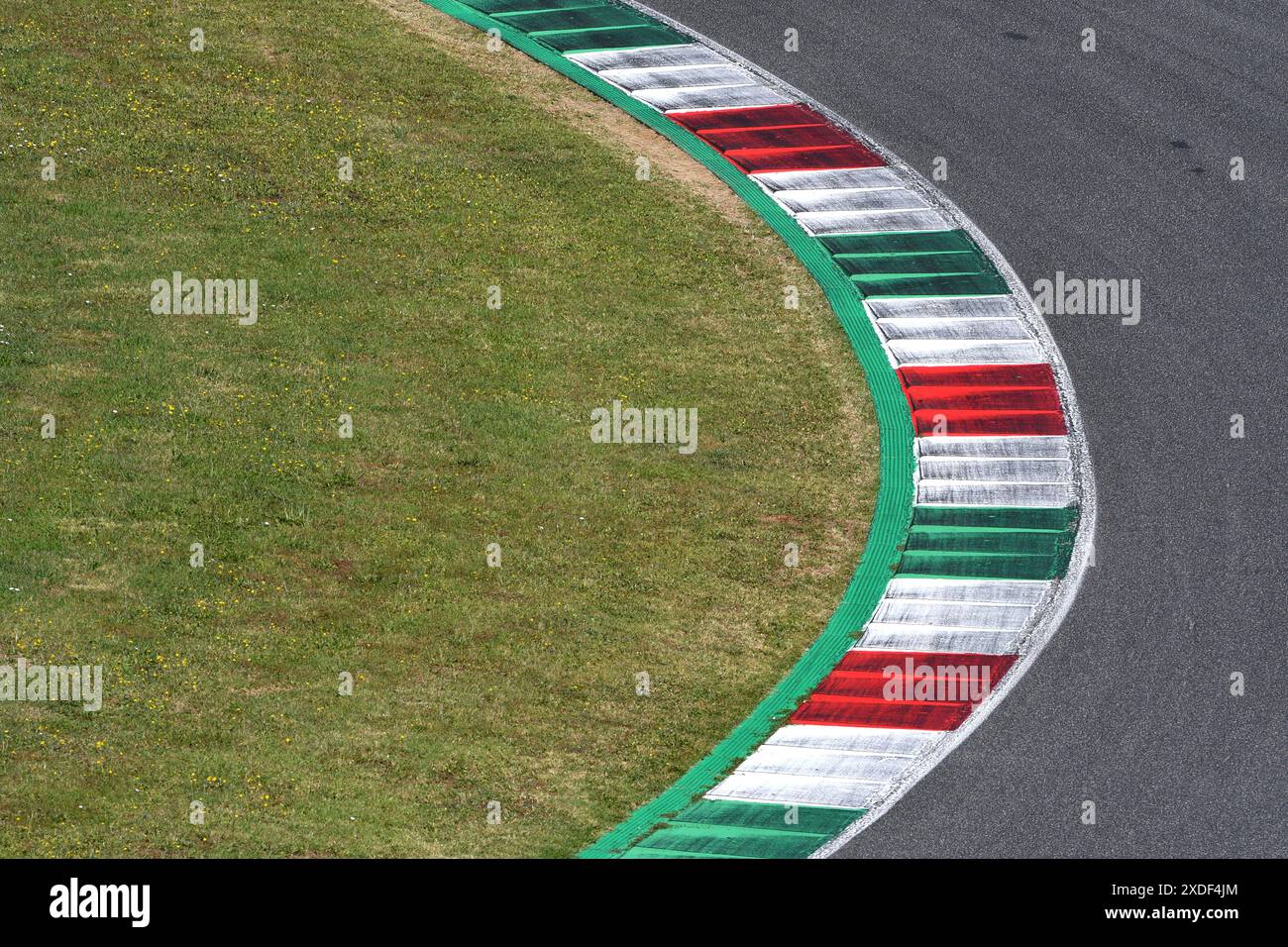 colored curb on a racing track Stock Photo - Alamy