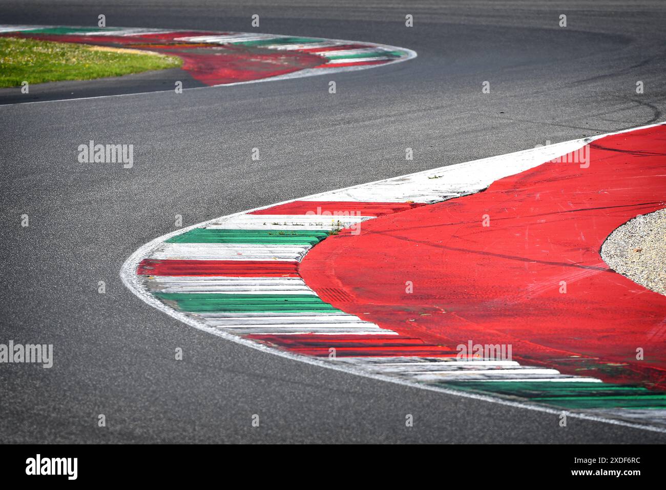 colored curb on a racing track Stock Photo - Alamy