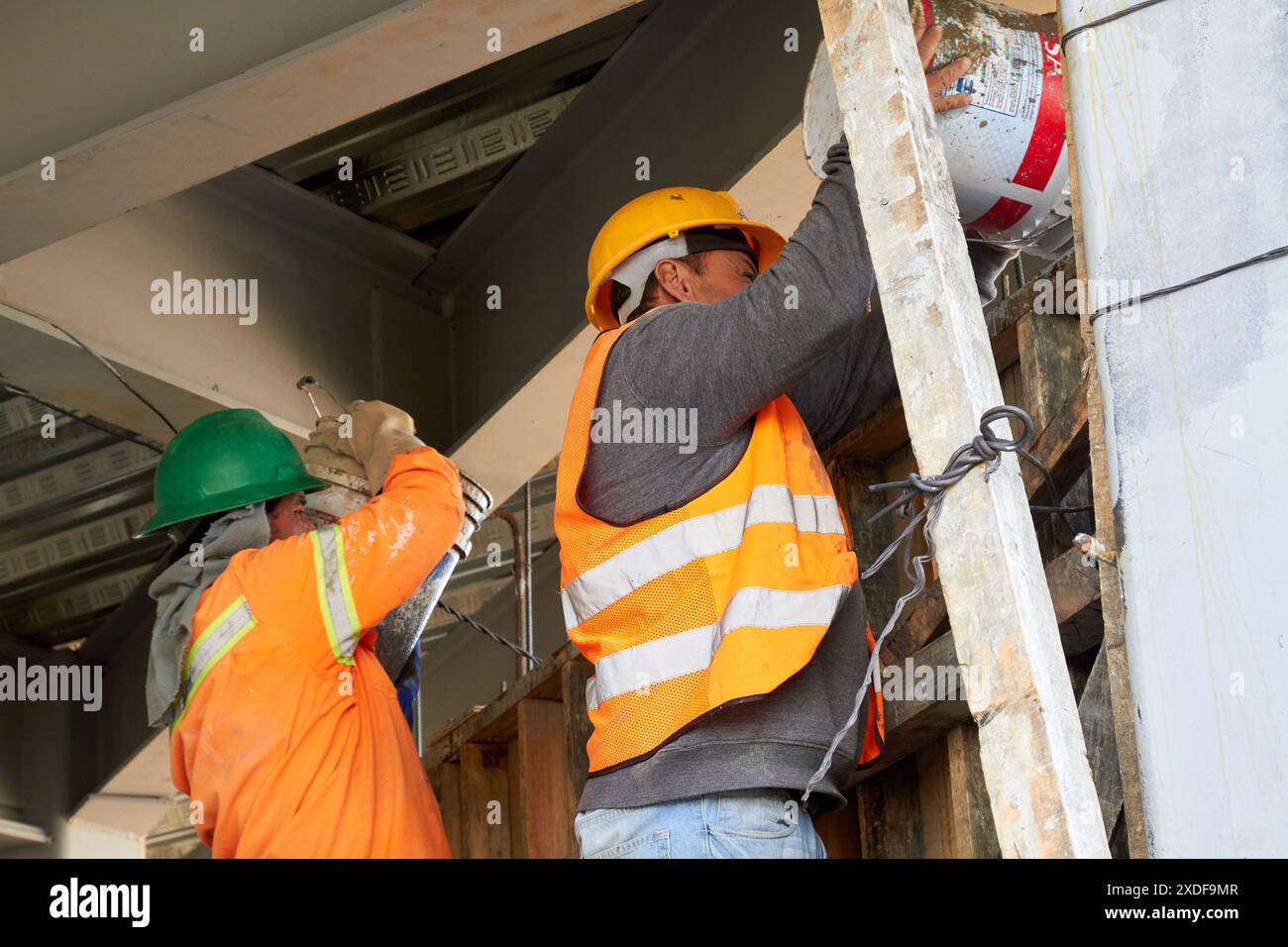 Mexican construction workers cement pouring concrete Stock Photo - Alamy