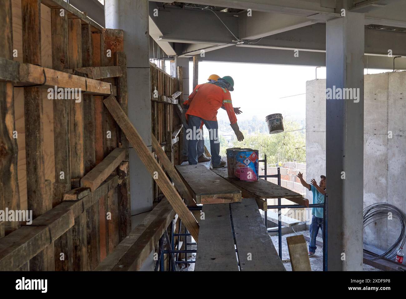 Mexican construction workers cement pouring concrete Stock Photo - Alamy