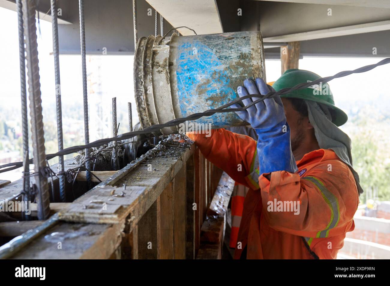 Mexican construction workers cement pouring concrete Stock Photo - Alamy