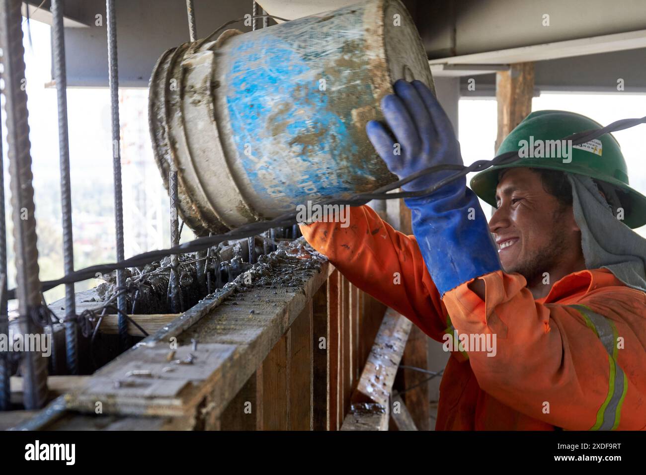 Mexican construction workers cement pouring concrete Stock Photo - Alamy