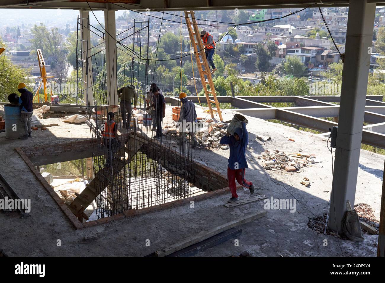 Mexican construction workers cement pouring concrete Stock Photo - Alamy