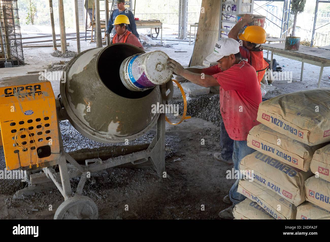 Mexican construction workers cement pouring concrete Stock Photo - Alamy