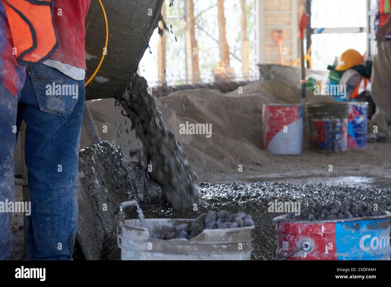 Mexican construction workers cement pouring concrete Stock Photo - Alamy