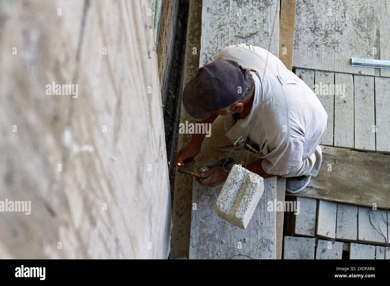 Mexican construction workers finishing interior house Stock Photo - Alamy