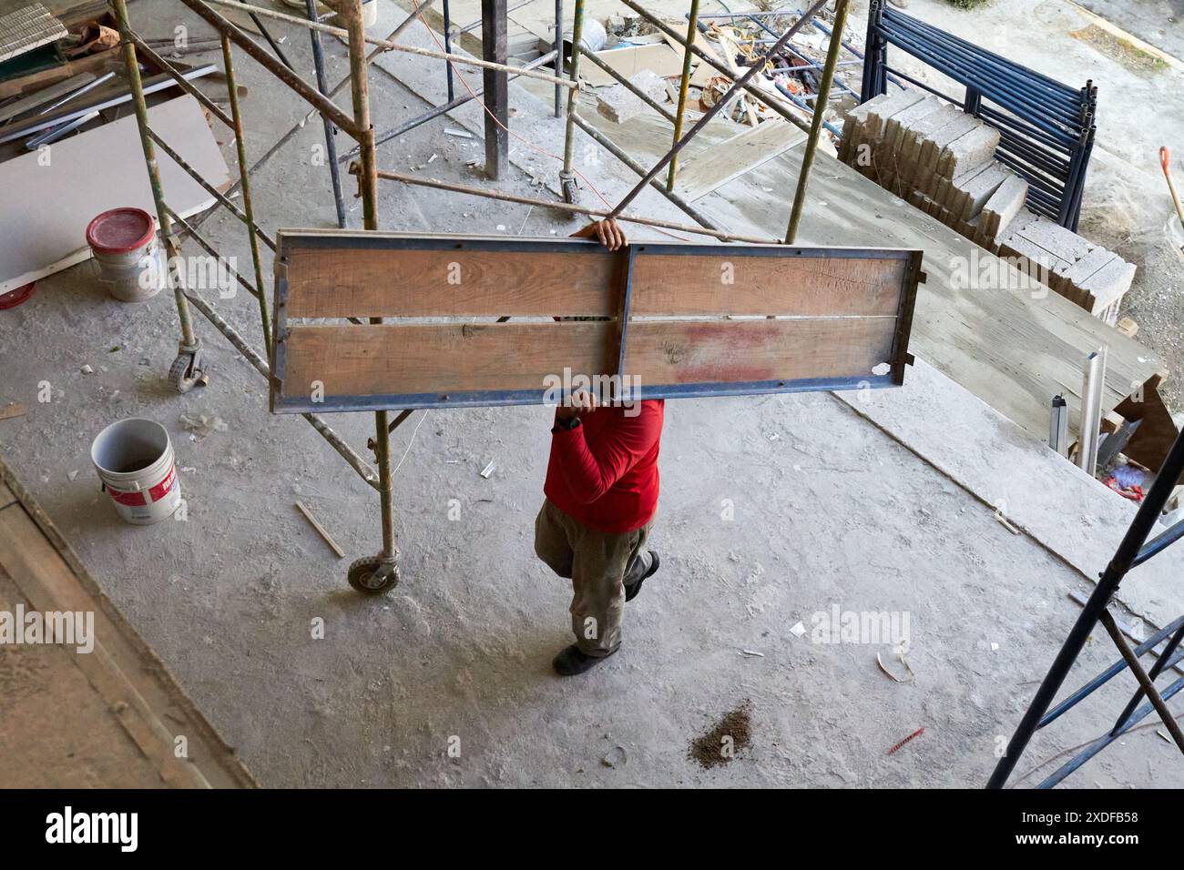 Mexican construction workers finishing interior house Stock Photo - Alamy