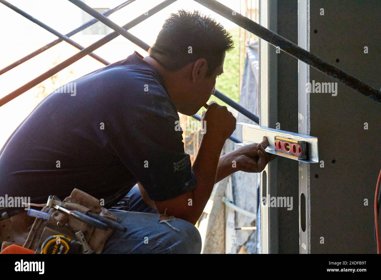 Mexican construction workers finishing interior house Stock Photo - Alamy