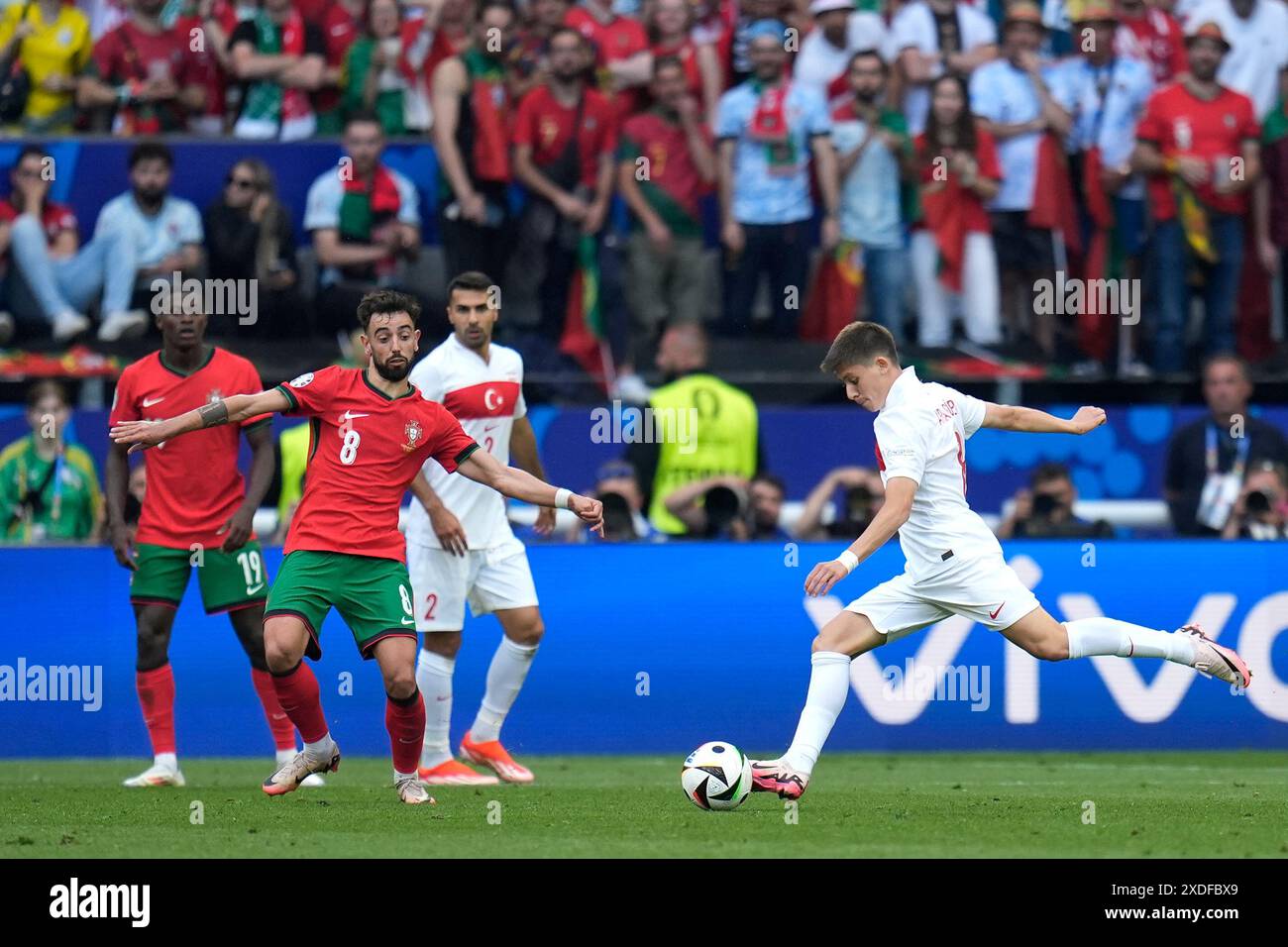 Turkey's Arda Guler (right) attempts a shot on goal during the UEFA ...