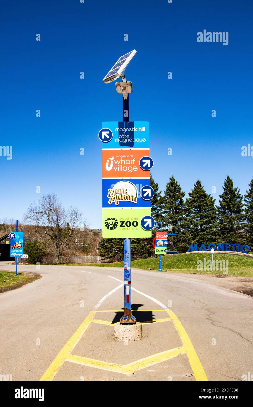 Directional sign to hill,wharf village, Magic Mountain and zoo at ...