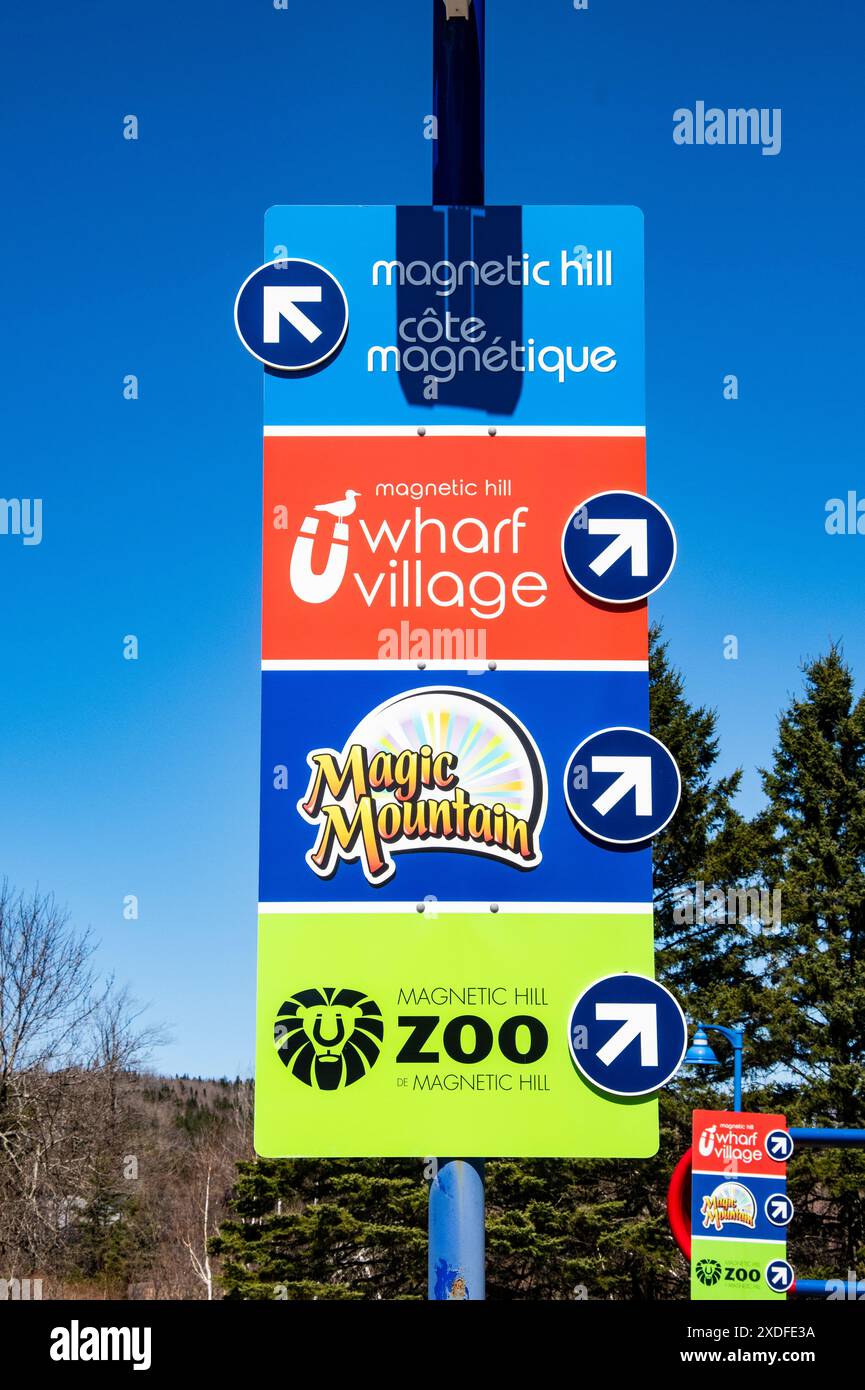 Directional sign to hill,wharf village, Magic Mountain and zoo at ...