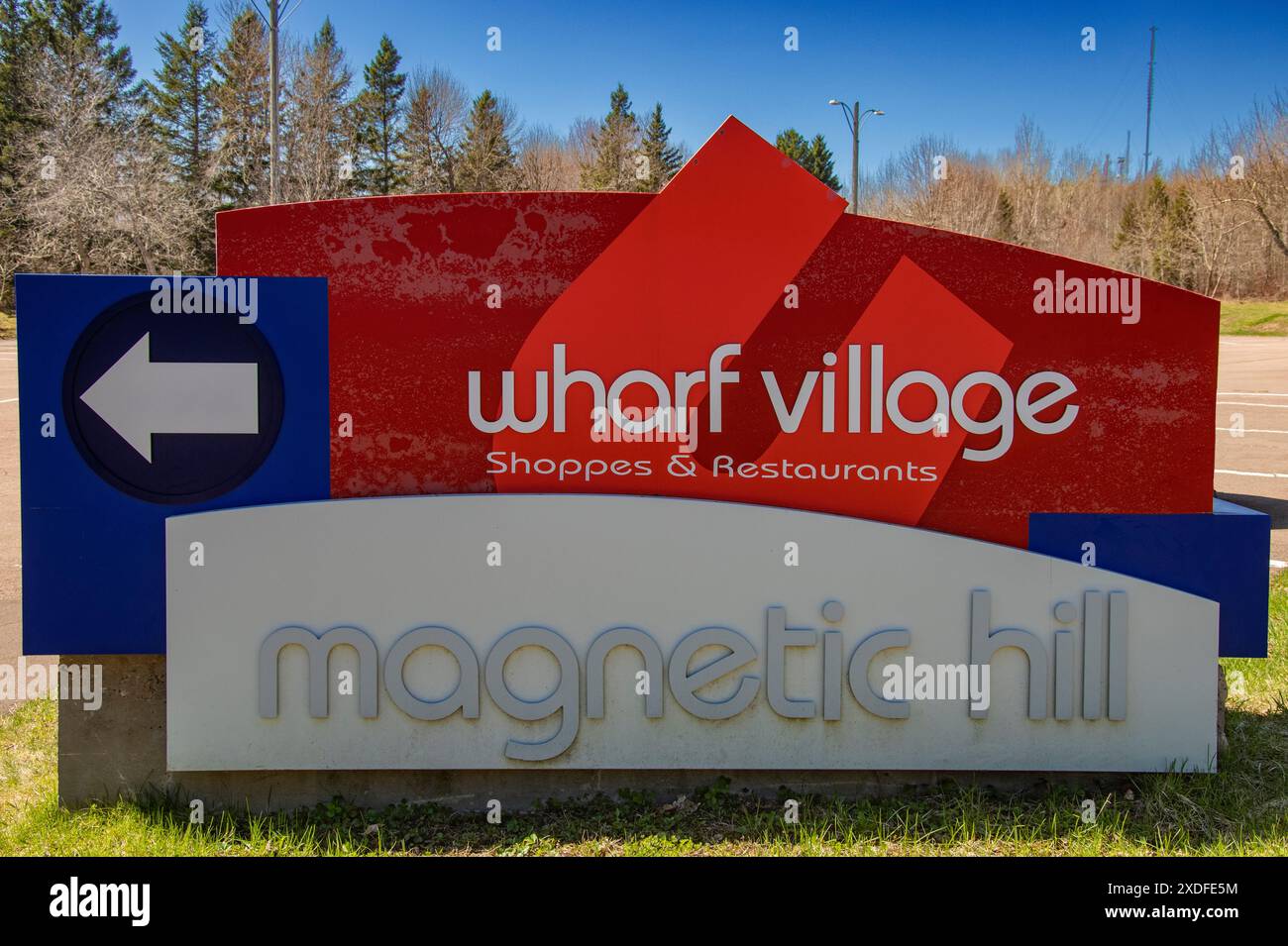 Directional sign to the wharf village at Magnetic Hill in Moncton, New ...
